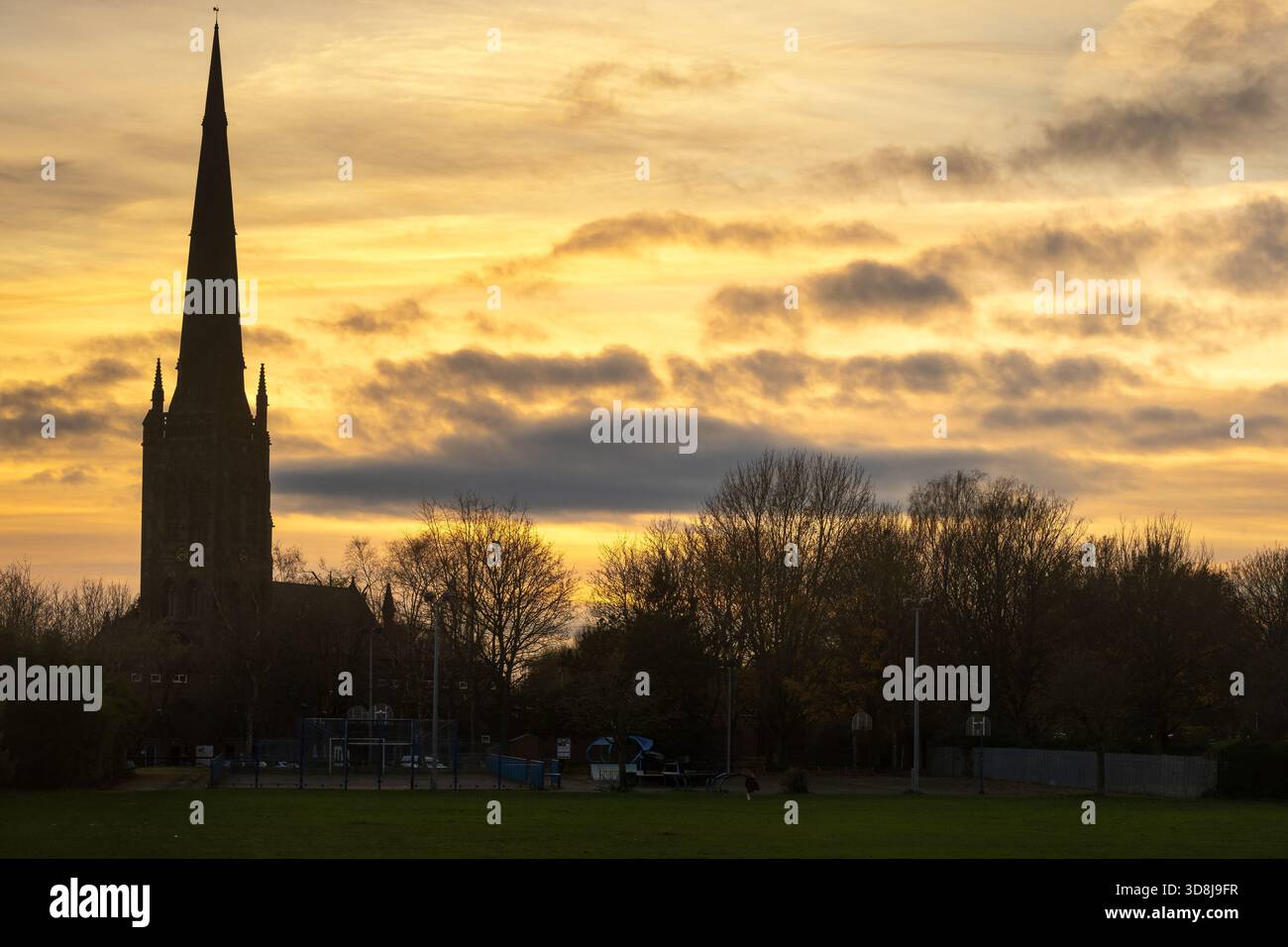 The mighty spire of Warrington parish church of St Elphins againts a ...
