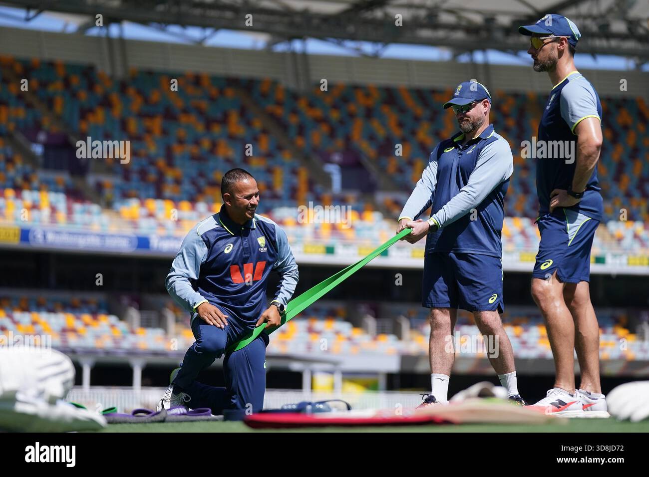 Australia's Usman Khawaja warms up during a nets session at The Gabba ...