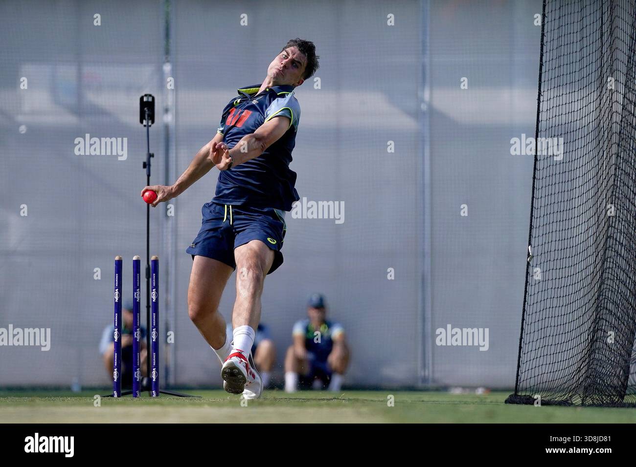 Australia's Pat Cummins bowls during a nets session at The Gabba ...
