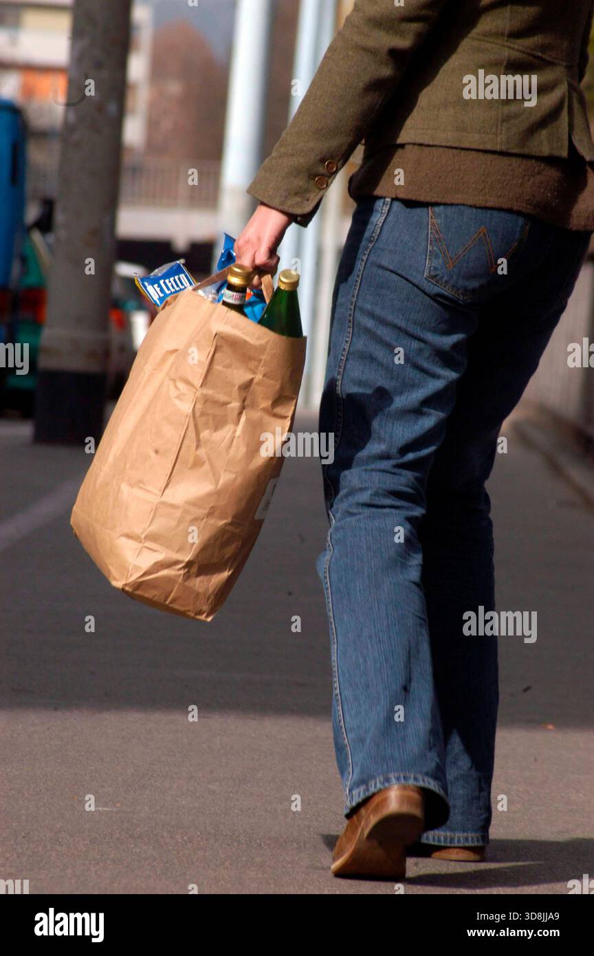 handing over a paper bag for transporting goods at the market paper bag ...