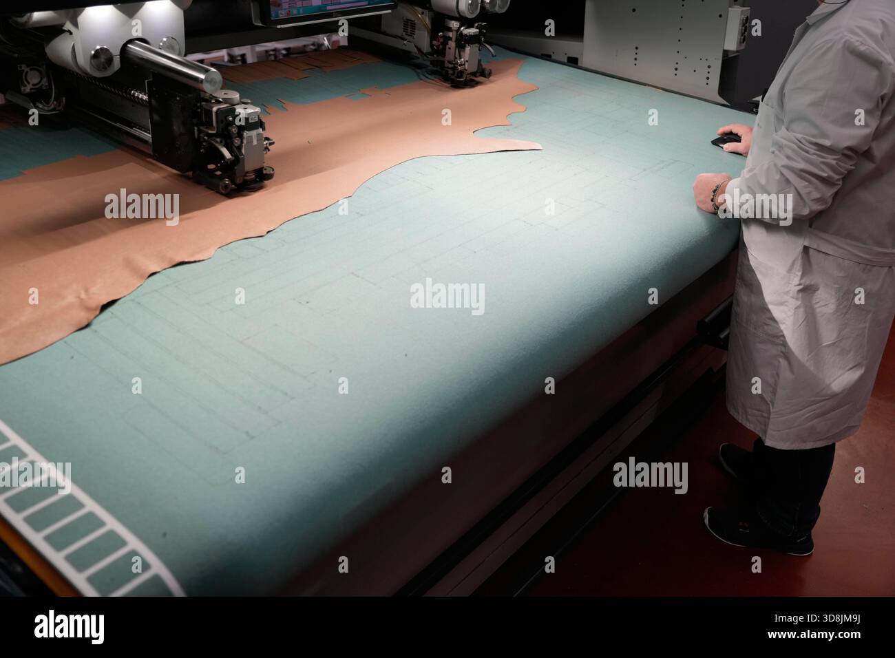 A leather good operator works at the Prada factory in Scandicci, Italy ...