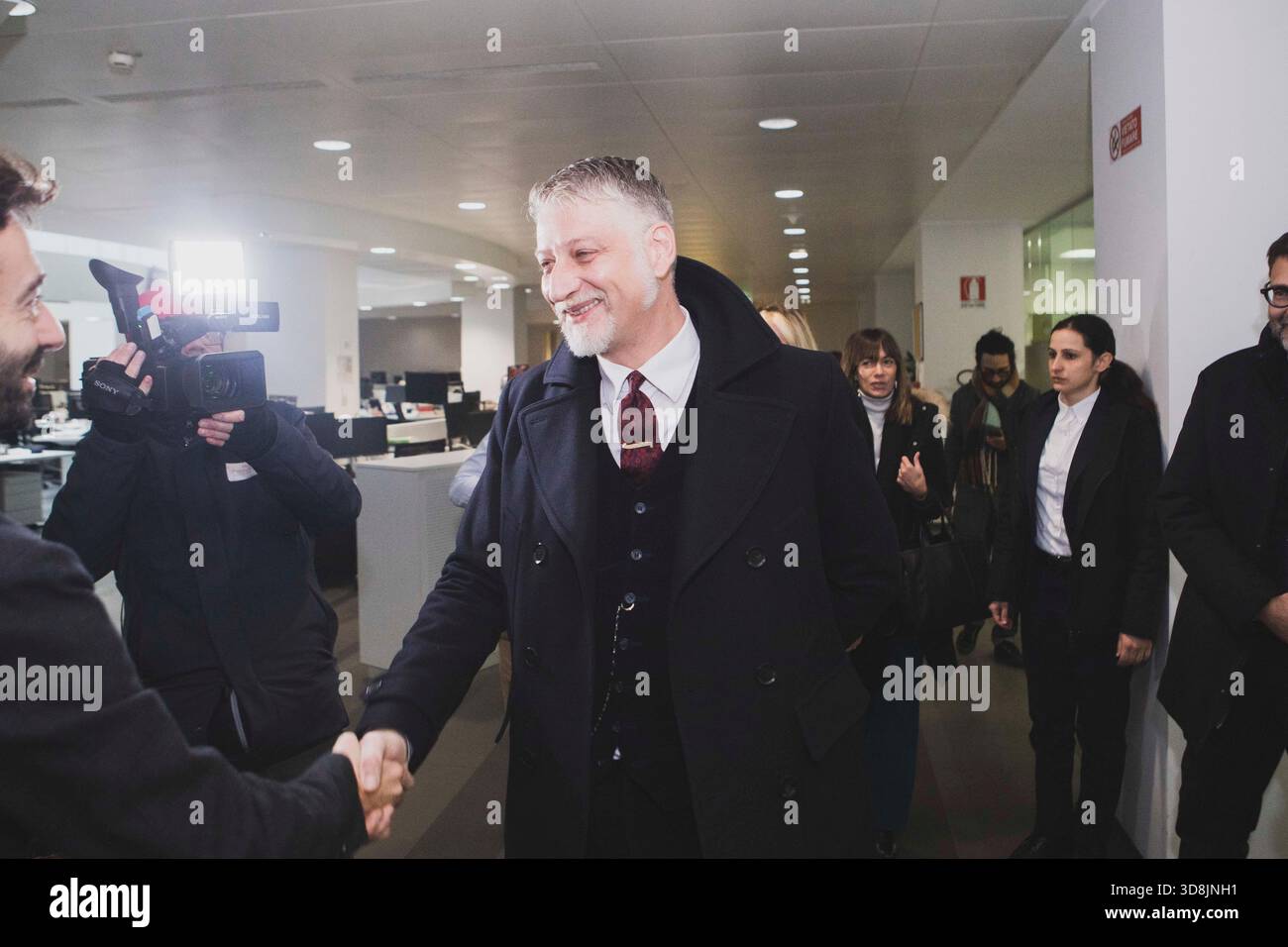 Il ministro della Cultura Alessandro Giuli in visita alla redazione de ...
