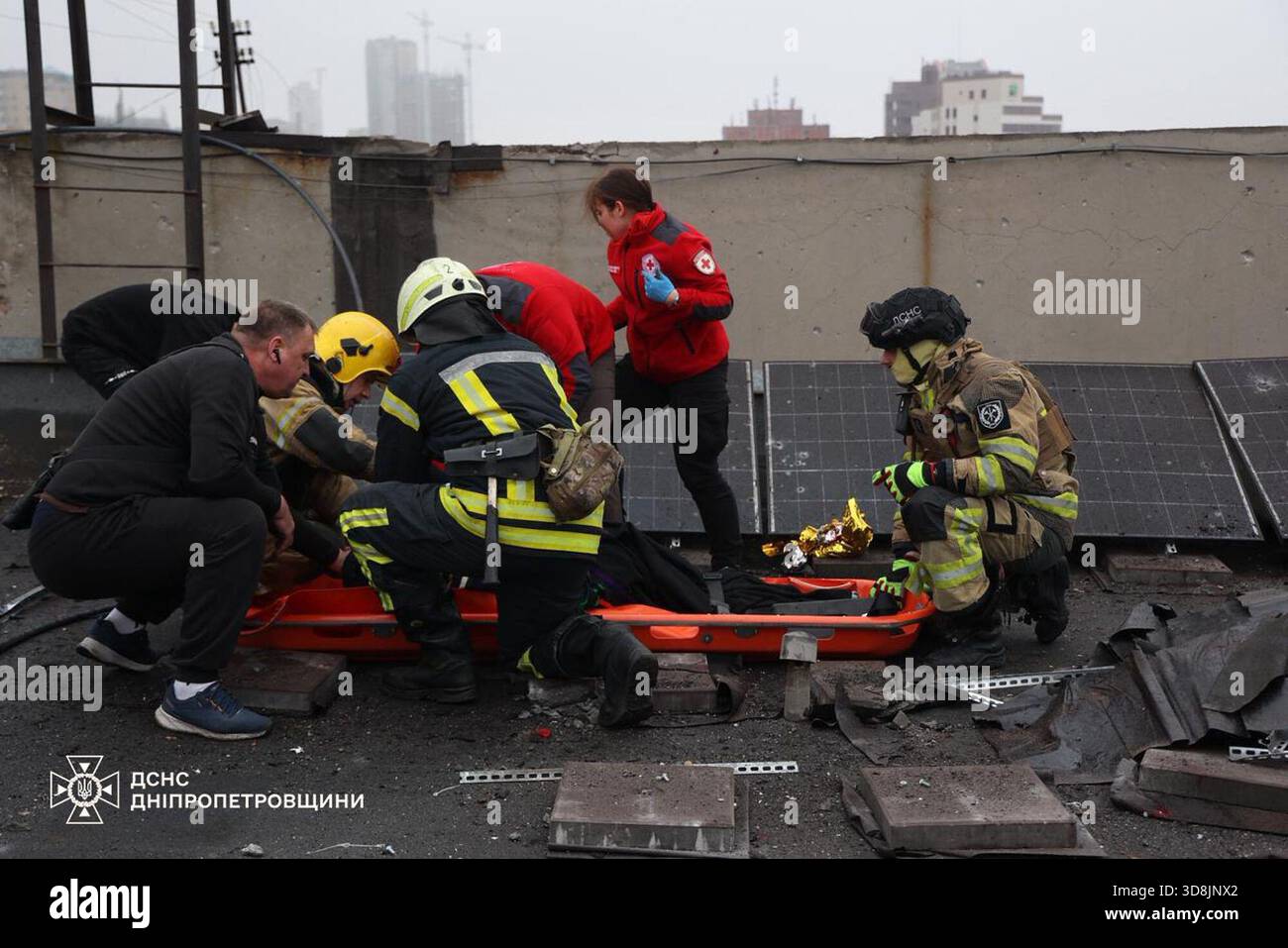 In this photo provided by the Ukrainian Emergency Service, emergency ...