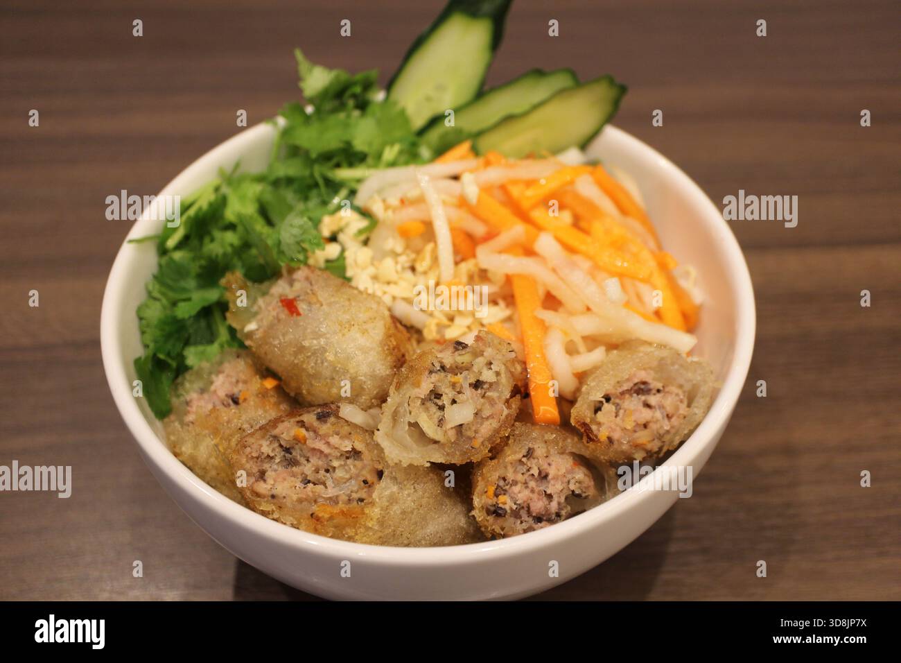 Vietnamese cuisine: bun cha gio (rice noodles topped with fried spring ...