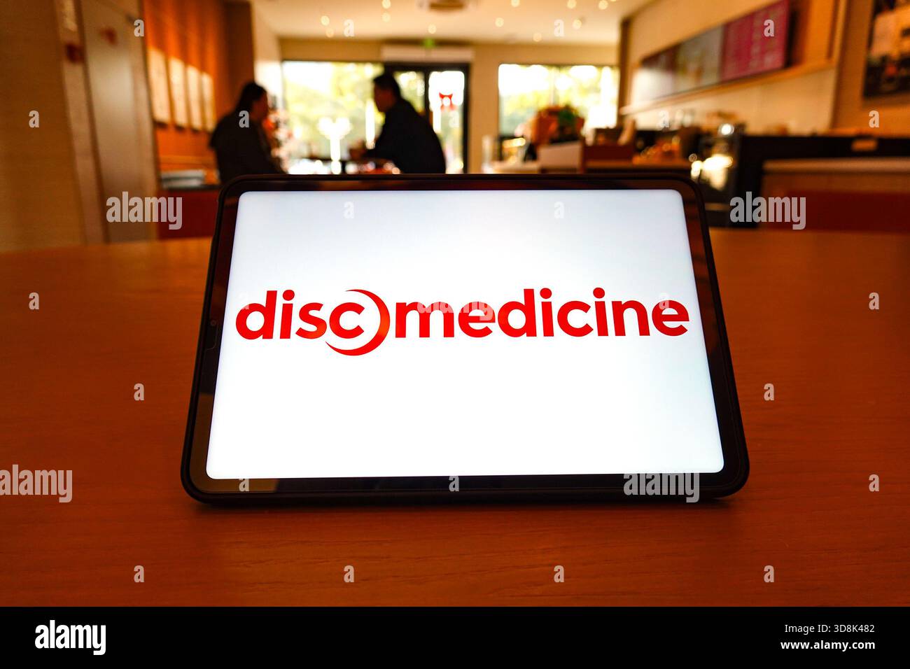 In this photo illustration, the discmedicine logo is seen displayed on ...