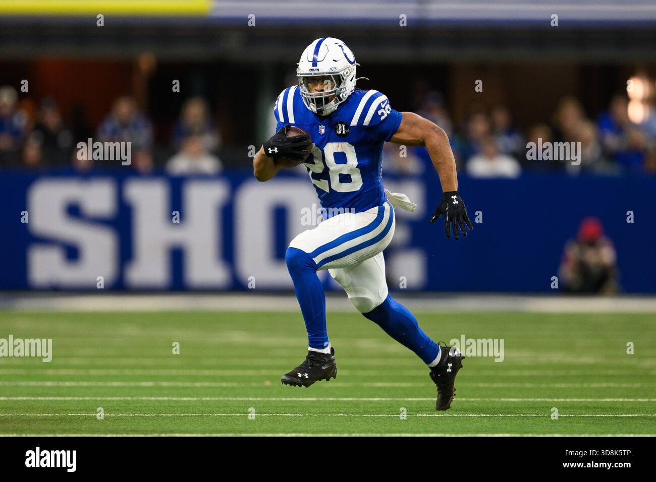 Indianapolis Colts running back Jonathan Taylor (28) runs with the ball during an NFL football ...