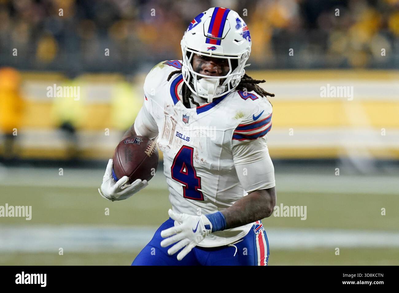 Buffalo Bills running back James Cook III (4) carries during the first ...