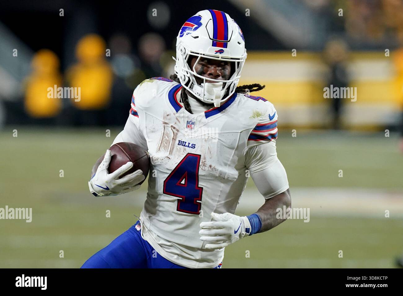 Buffalo Bills running back James Cook III (4) carries during the first ...