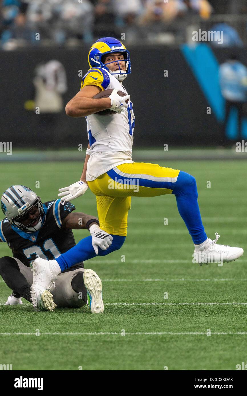 Los Angeles Rams wide receiver Puka Nacua fights for yards against the ...