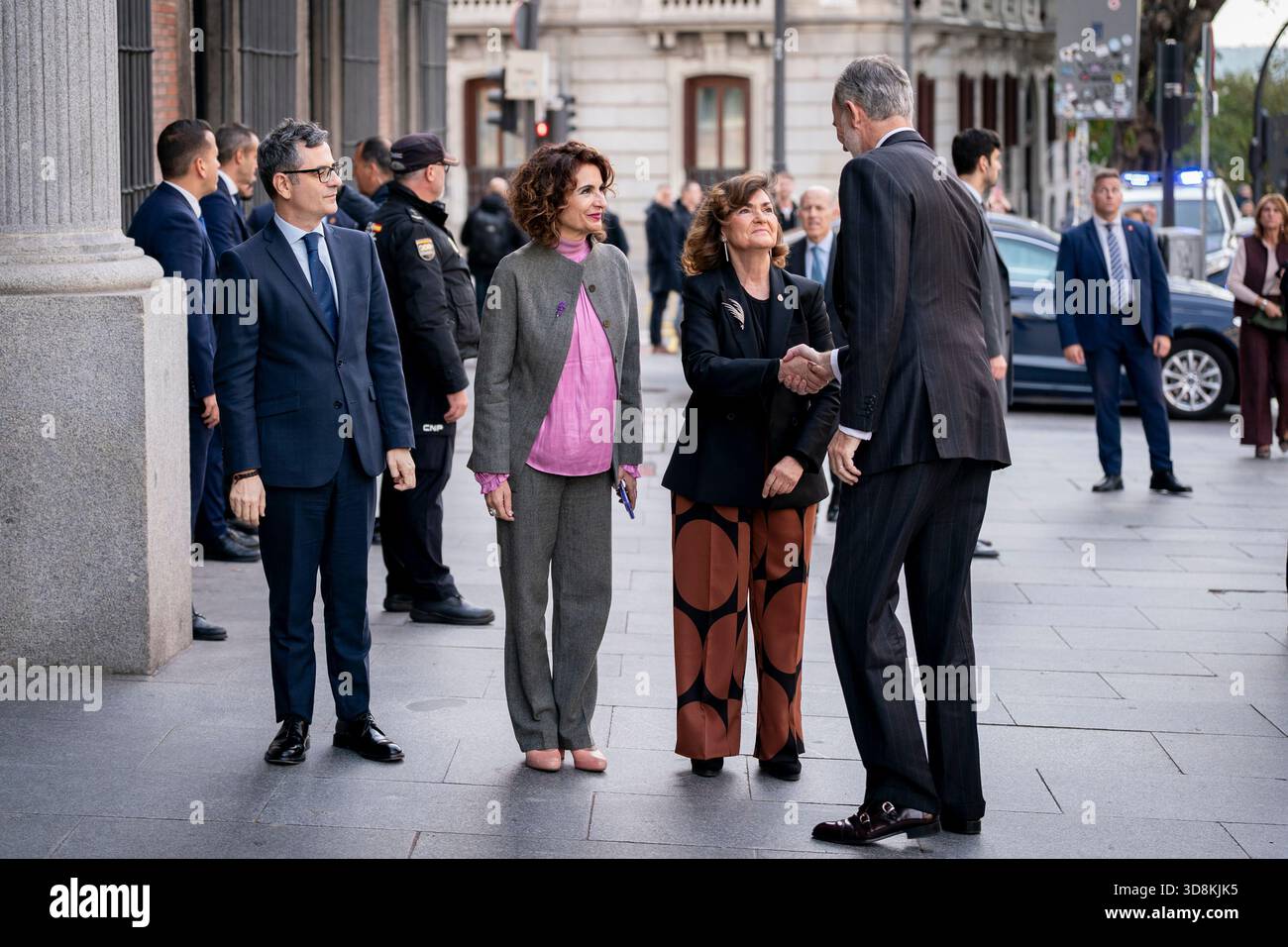 King Felipe VI (r) greets the Minister of the Presidency, Justice and ...