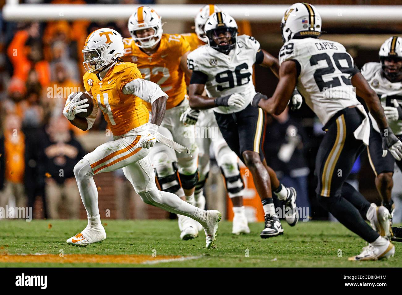 Tennessee wide receiver Mike Matthews (4) outruns Vanderbilt defensive ...