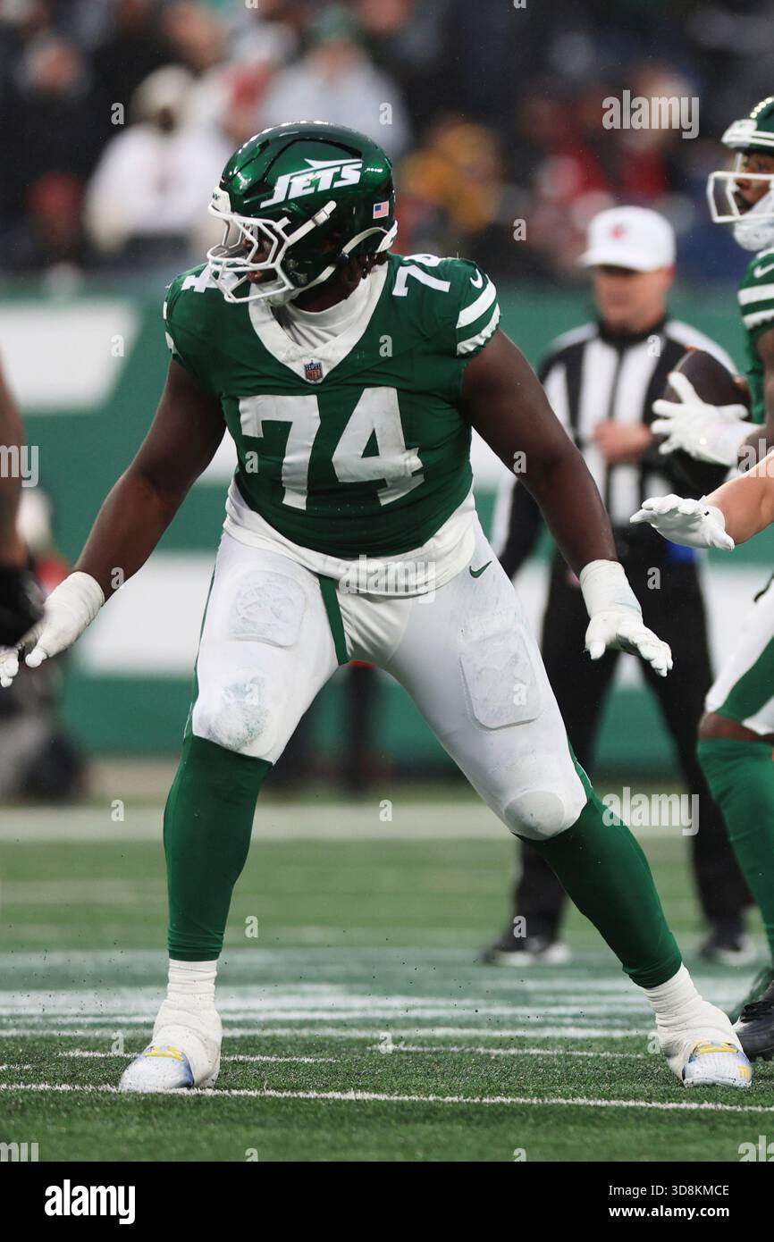 New York Jets offensive tackle Olu Fashanu (74) prepares to block ...