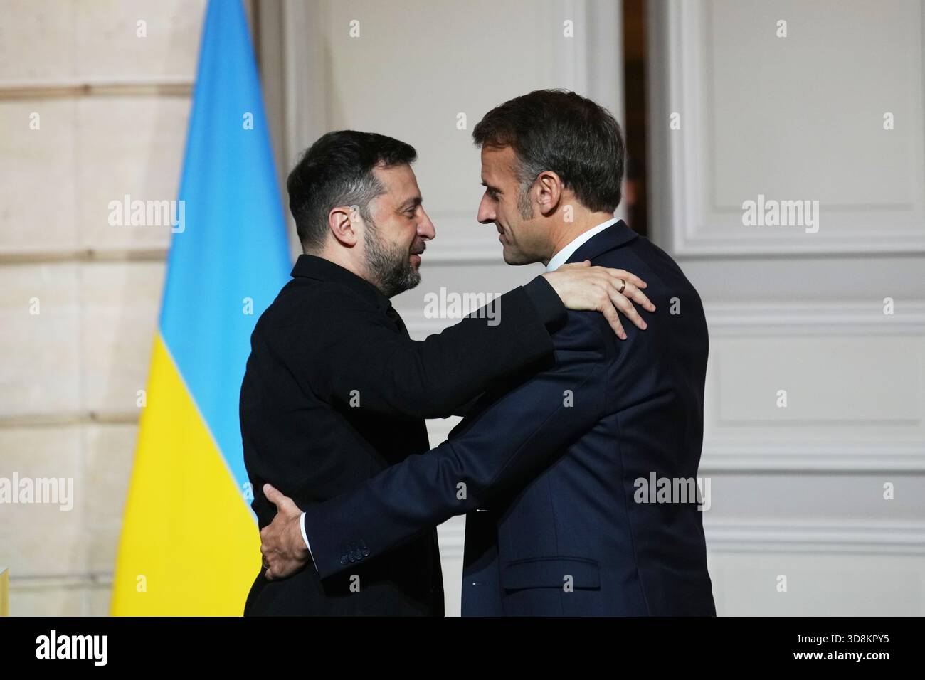 French President Emmanuel Macron, right, and Ukrainian President ...