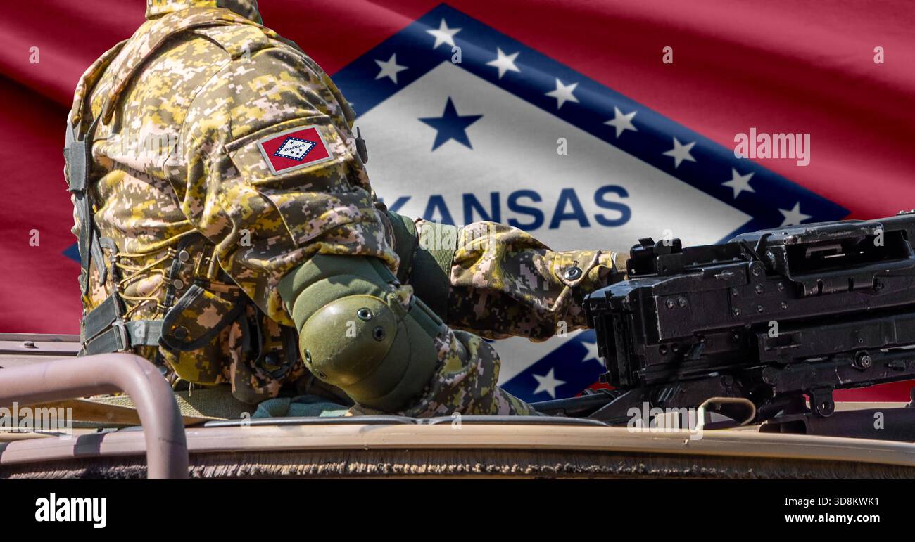 Arkansas US state flag with soldier at machine gun turret in front of ...