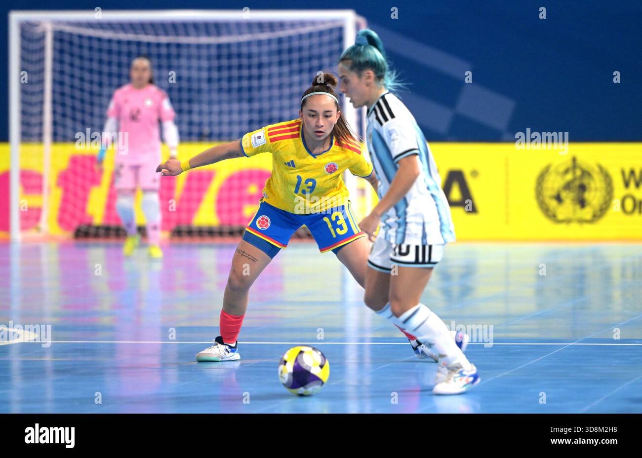 Laura Fernanda Bustos Silva (L) of Colombia Women Futsal team and ...