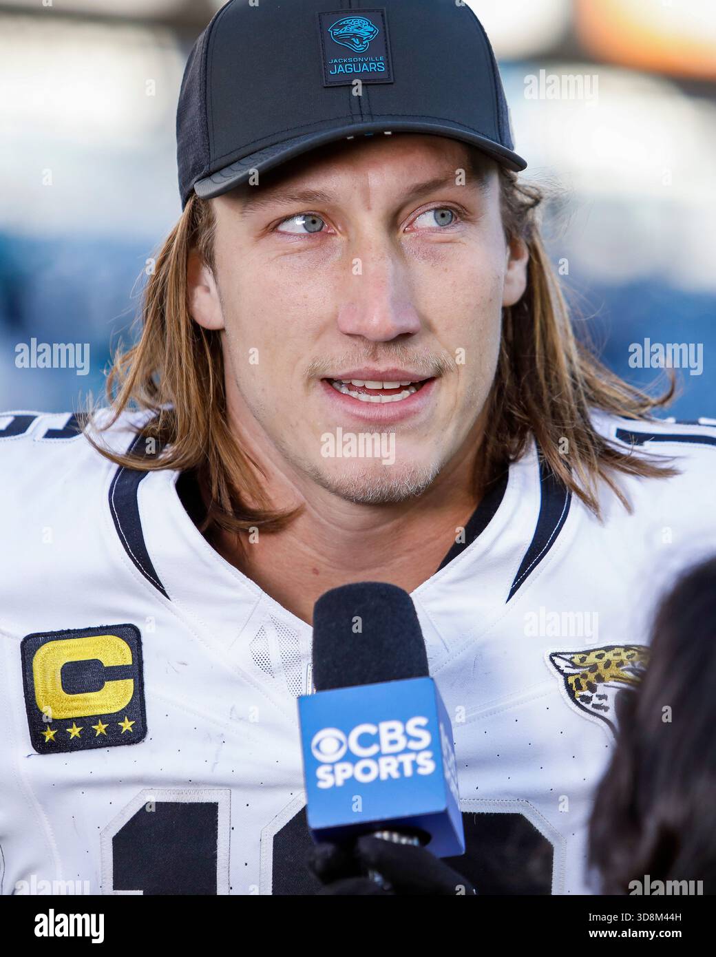 Jacksonville Jaguars quarterback Trevor Lawrence (16) speaks with the ...