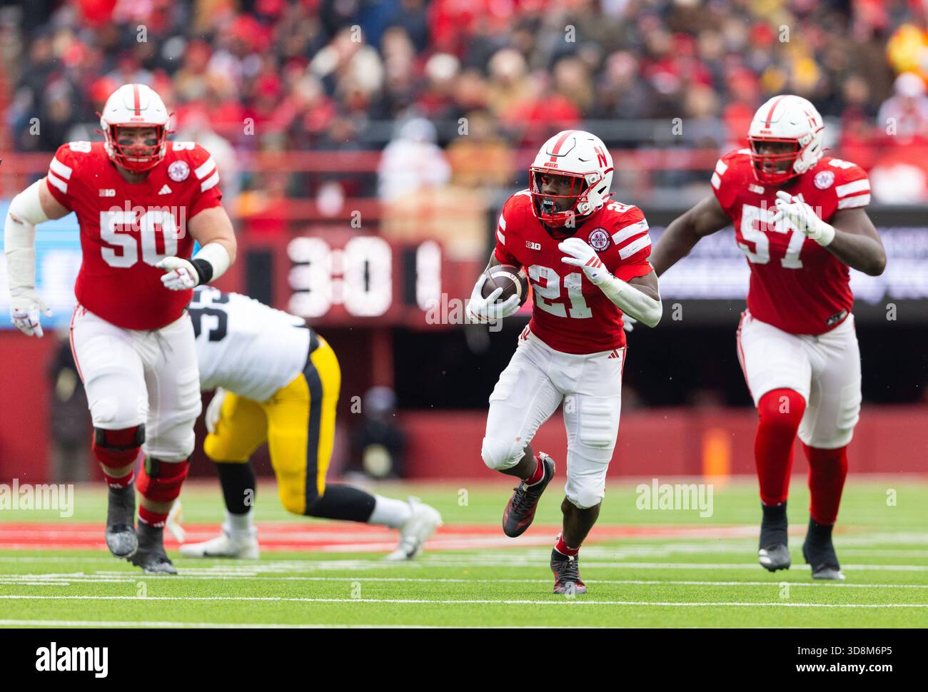 Nebraska running back Emmett Johnson (21) rushes against Iowa during ...