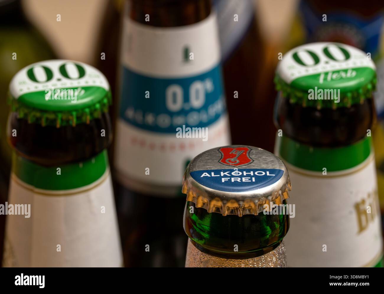 26 November 2025, Berlin: Several bottles of non-alcoholic beer from ...