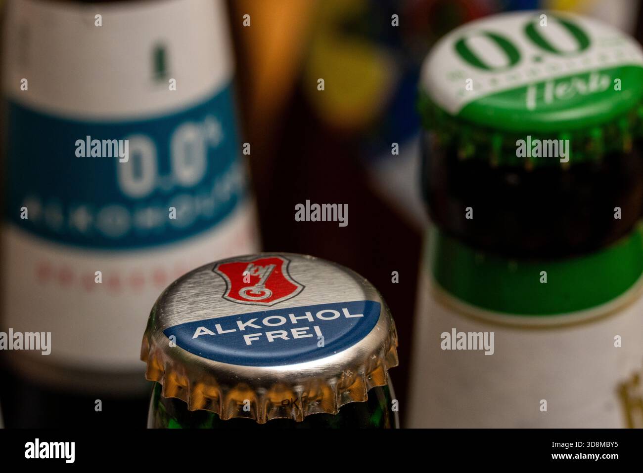 26 November 2025, Berlin: Several bottles of non-alcoholic beer from ...