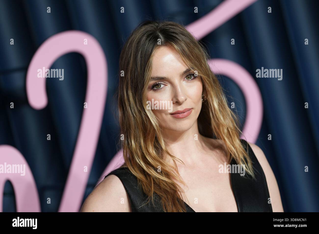 Jodie Comer poses for photographers upon arrival at 'The Fashion Awards ...