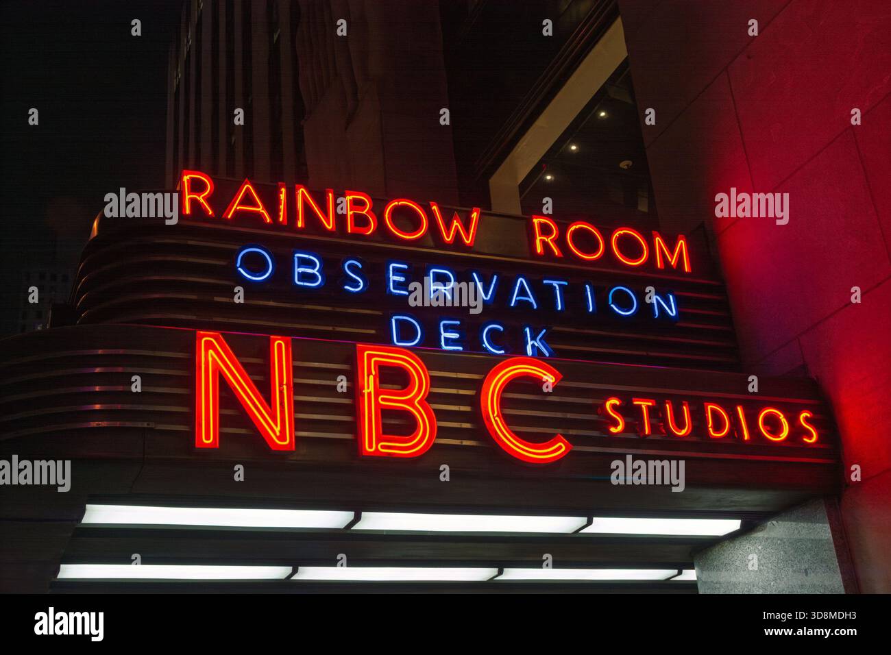 A neon sign at Radio City Music Hall indicates the entrance for NBC ...
