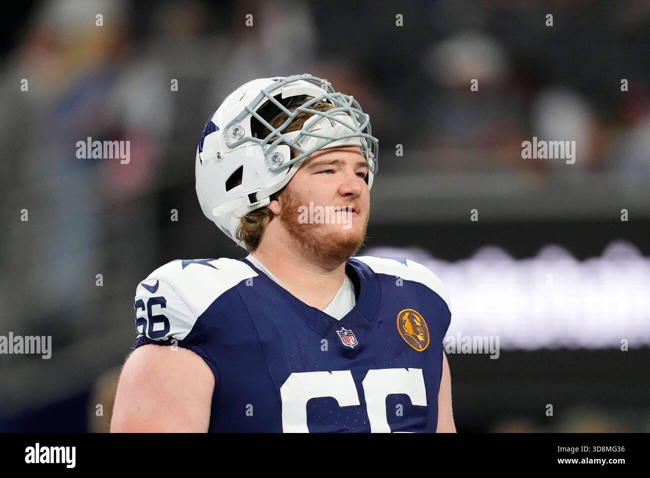 Dallas Cowboys guard T.J. Bass warms up before an NFL football game ...