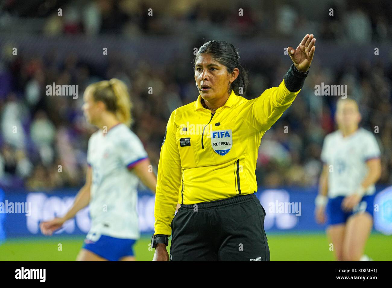 Orlando, USA, November 28, 2025, Ref Sandra Benitez points to the ...