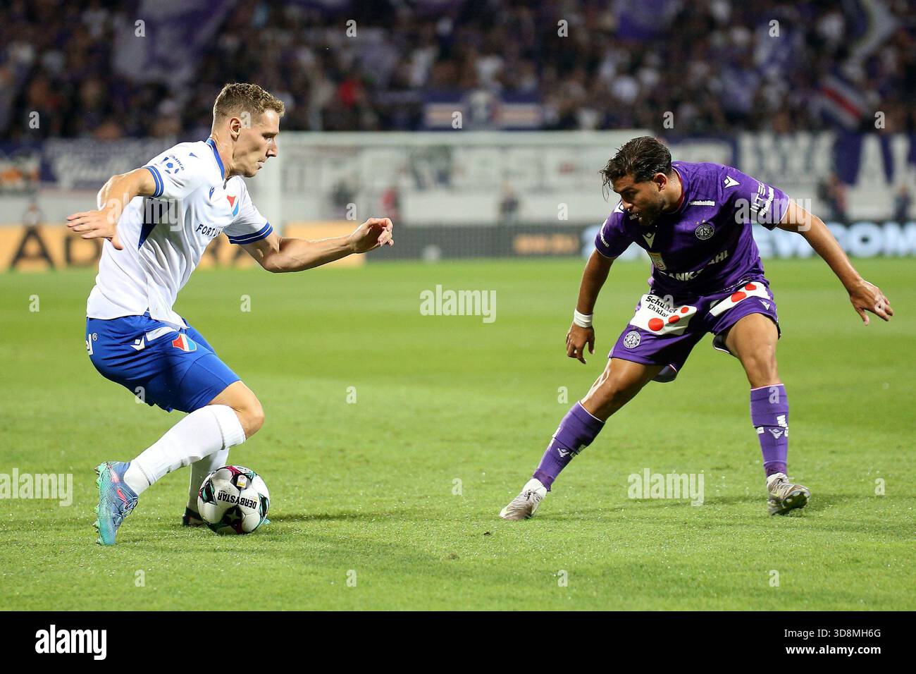 VIENNA, AUSTRIA - AUGUST 14: Michal Kohut of FC Banik Ostrava and Hakim ...