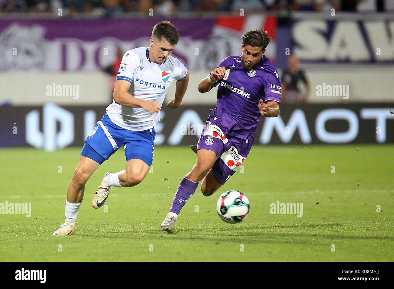 VIENNA, AUSTRIA - AUGUST 14: David Buchta of FC Banik Ostrava and Hakim ...
