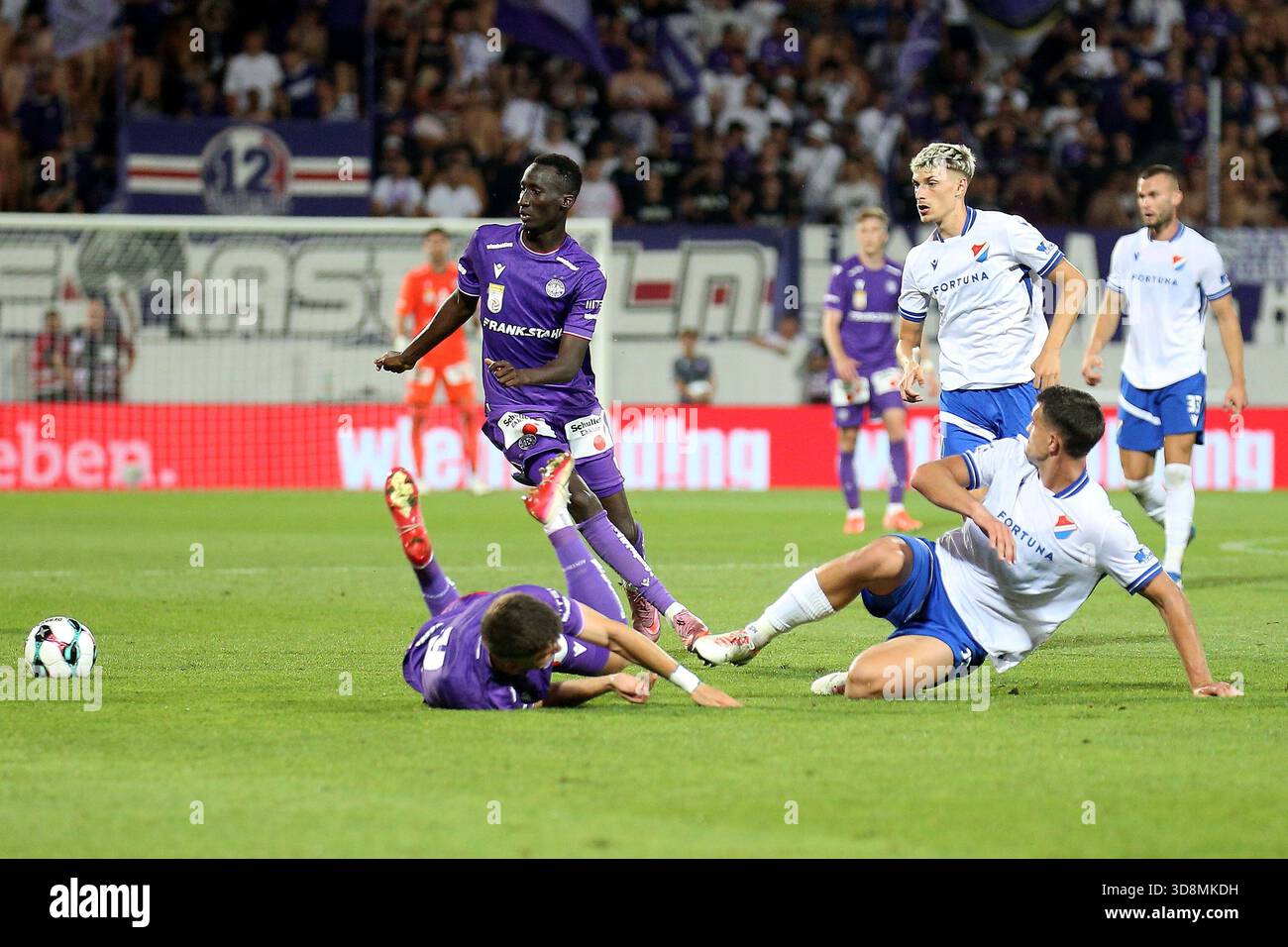 VIENNA, AUSTRIA - AUGUST 14: Noah Botic, Abubakr Barry of Austria Wien ...