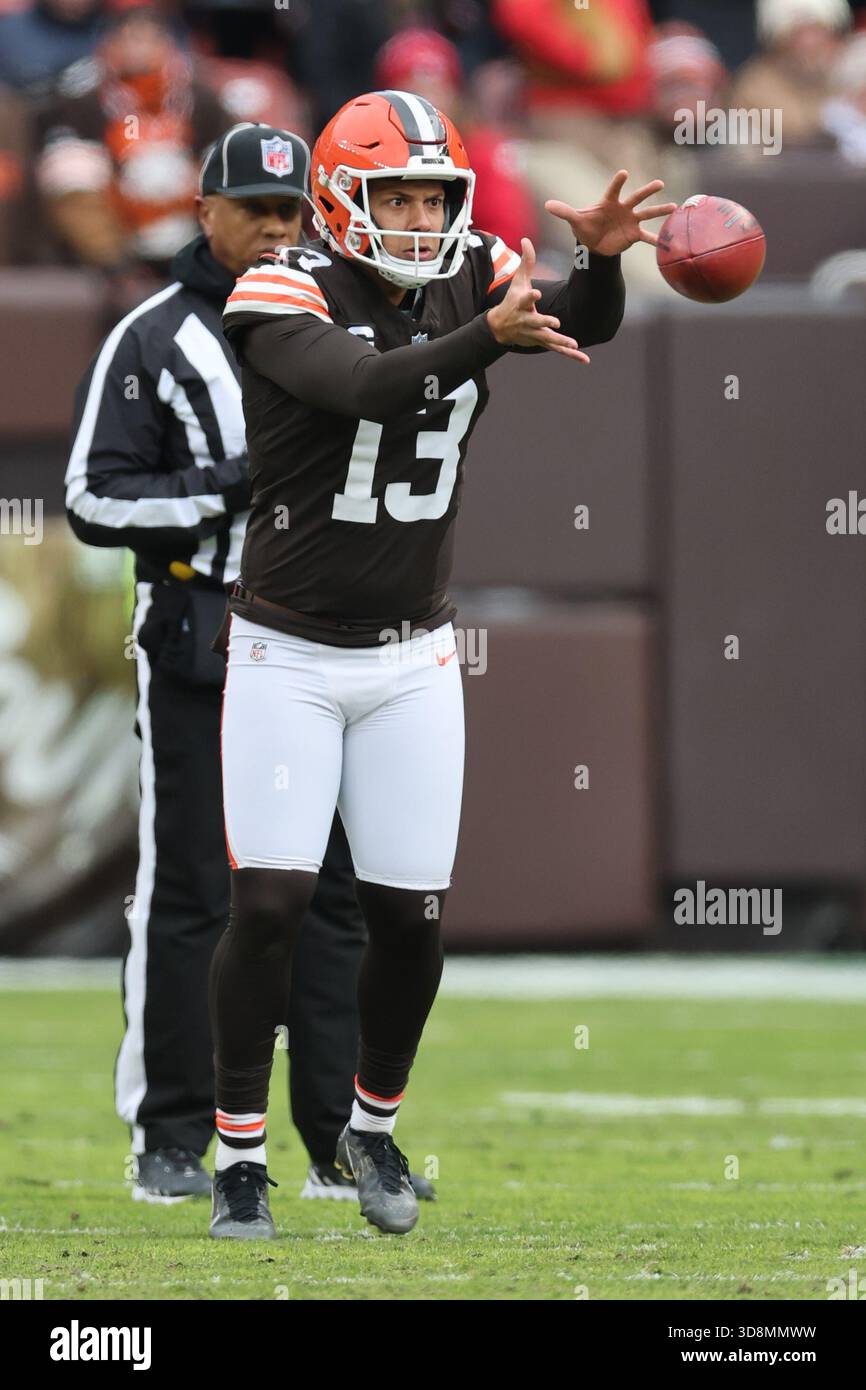 Cleveland Browns punter Corey Bojorquez (13) takes the snap against the ...