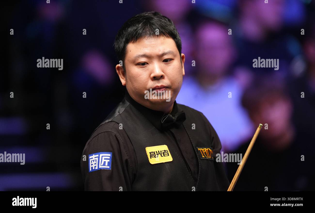 Zhang Anda in action against Gary Wilson, on day three of the 2025 ...