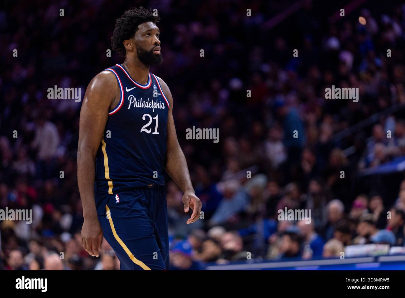 Philadelphia 76ers' Joel Embiid looks on during an NBA basketball game ...