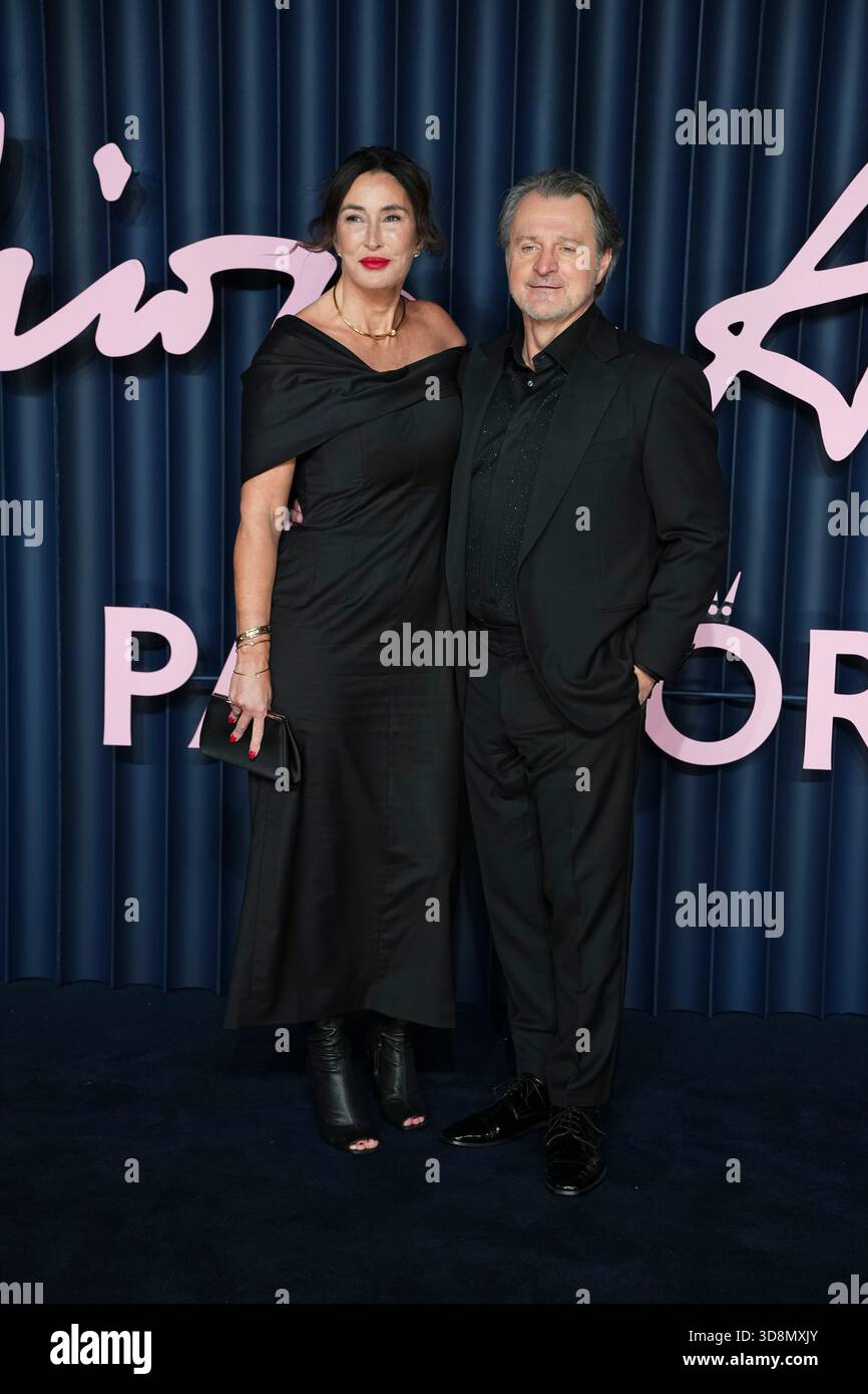 Maria Lacik and Alexander Lacik pose for photographers upon arrival at ...