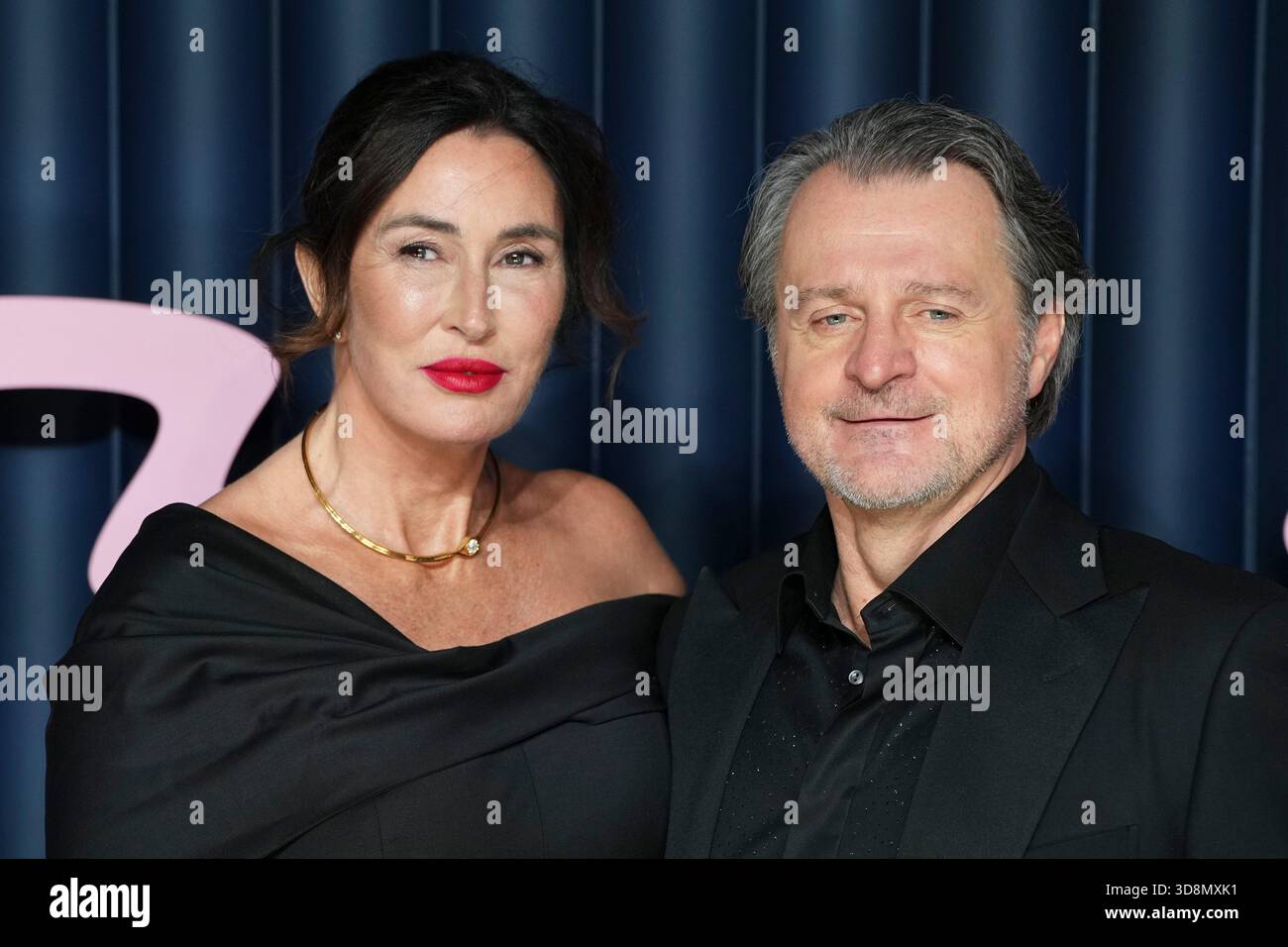 Maria Lacik and Alexander Lacik pose for photographers upon arrival at ...