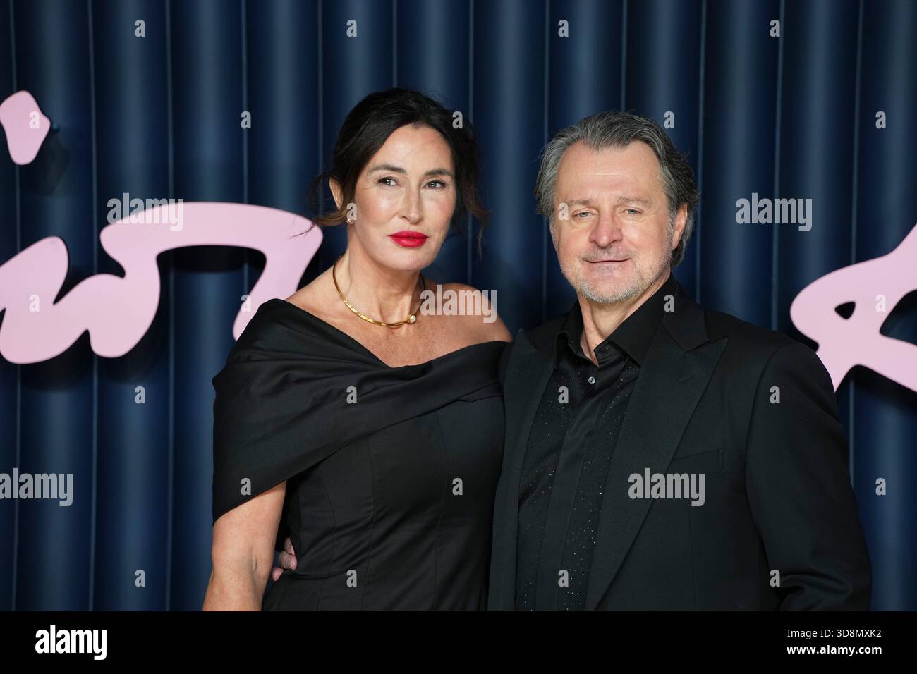Maria Lacik and Alexander Lacik pose for photographers upon arrival at ...