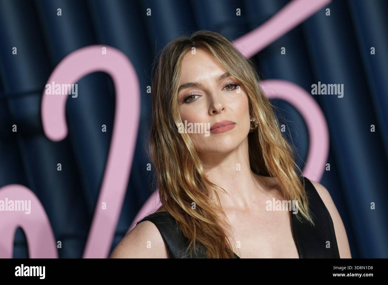 Jodie Comer poses for photographers upon arrival at 'The Fashion Awards ...
