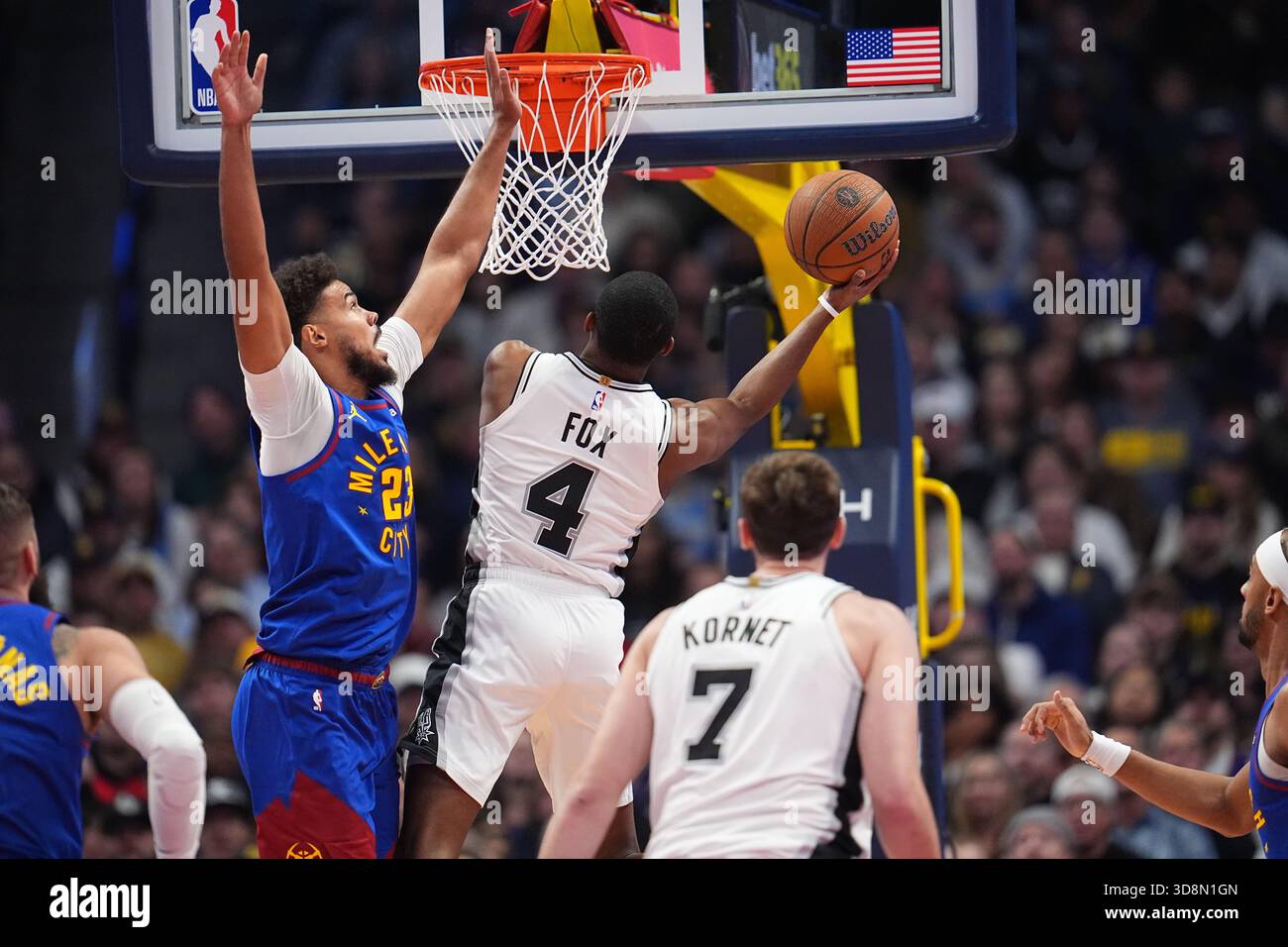 Denver Nuggets forward Cameron Johnson (23) and San Antonio Spurs guard ...