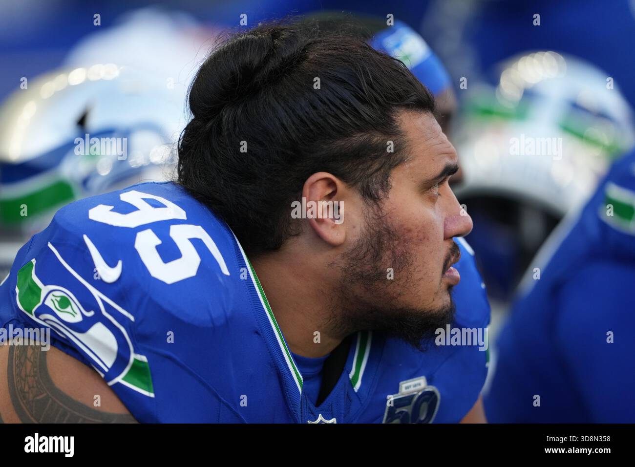 Seattle Seahawks defensive tackle Brandon Pili (95) looks on during an ...