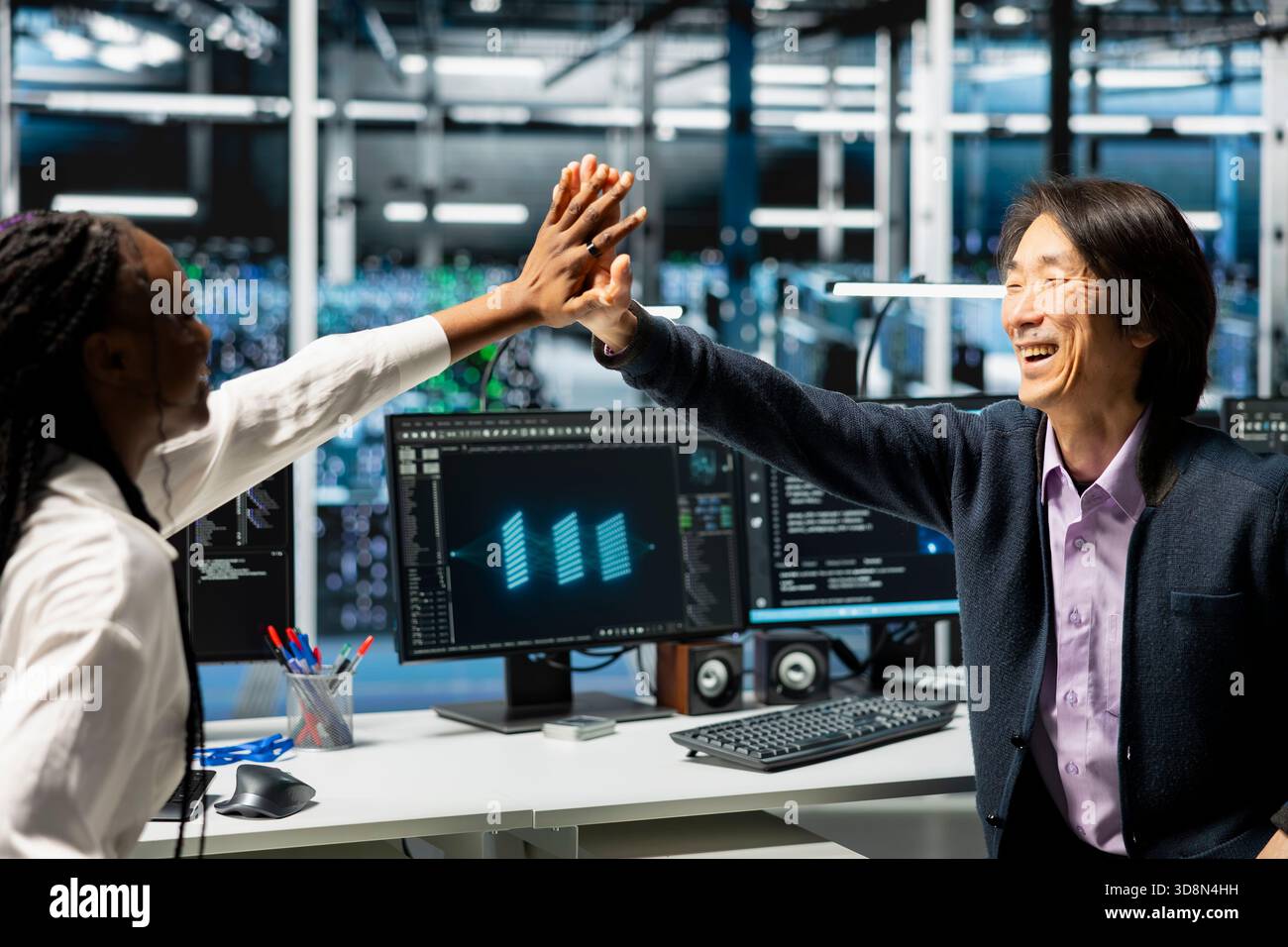 Jolly data center programmers hi-res stock photography and images - Alamy