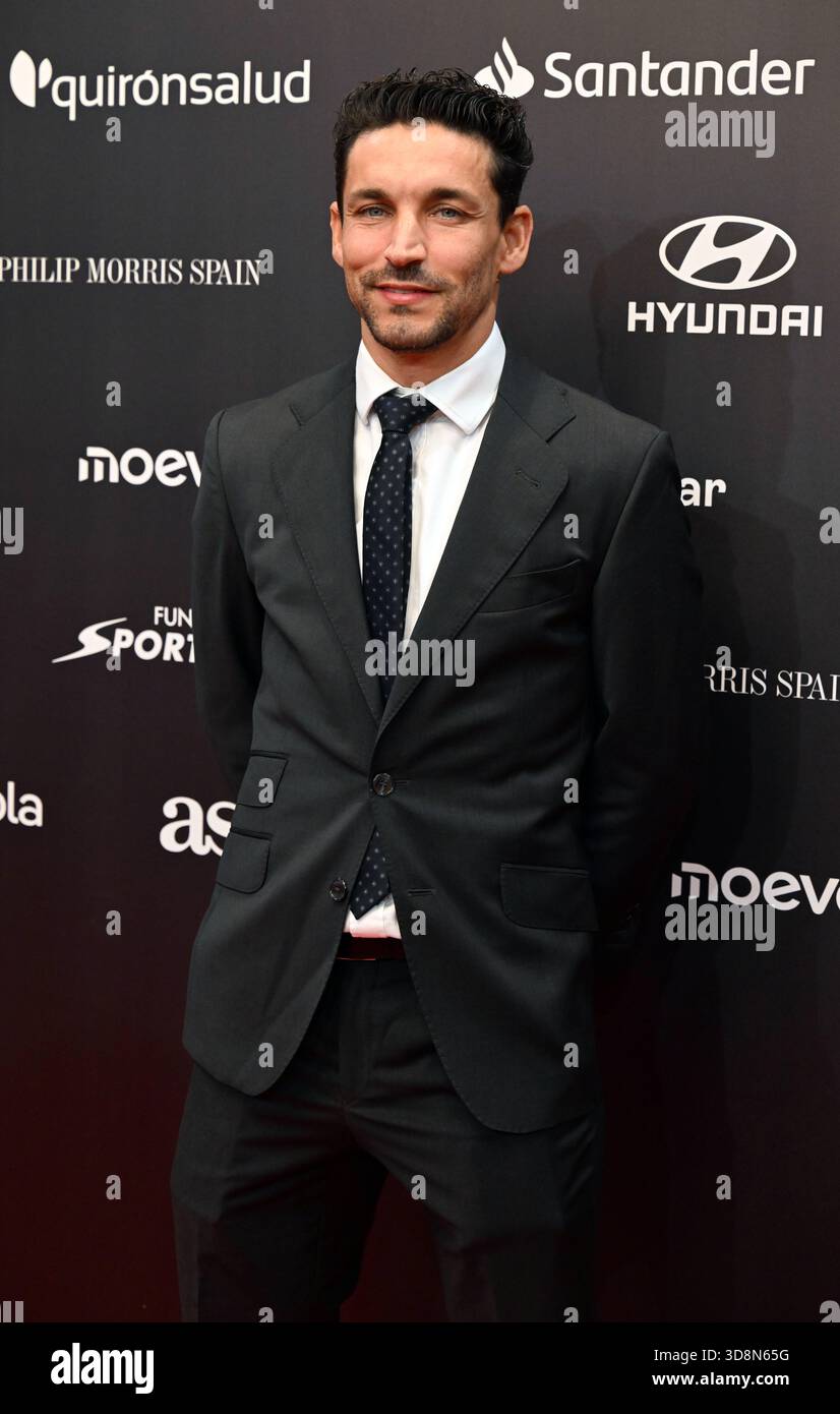 Former soccer player Jesús Navas poses at the photocall of the AS ...
