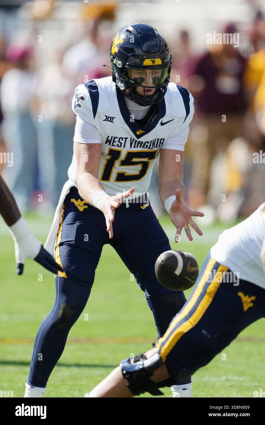 West Virginia quarterback Scotty Fox Jr. takes the snap during the ...