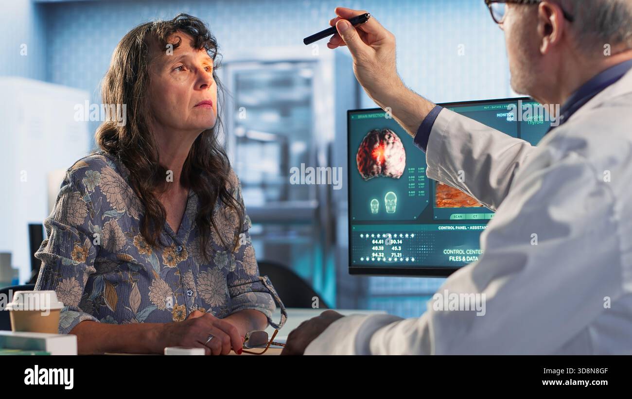 Doctor performing reflex test on hi-res stock photography and images ...