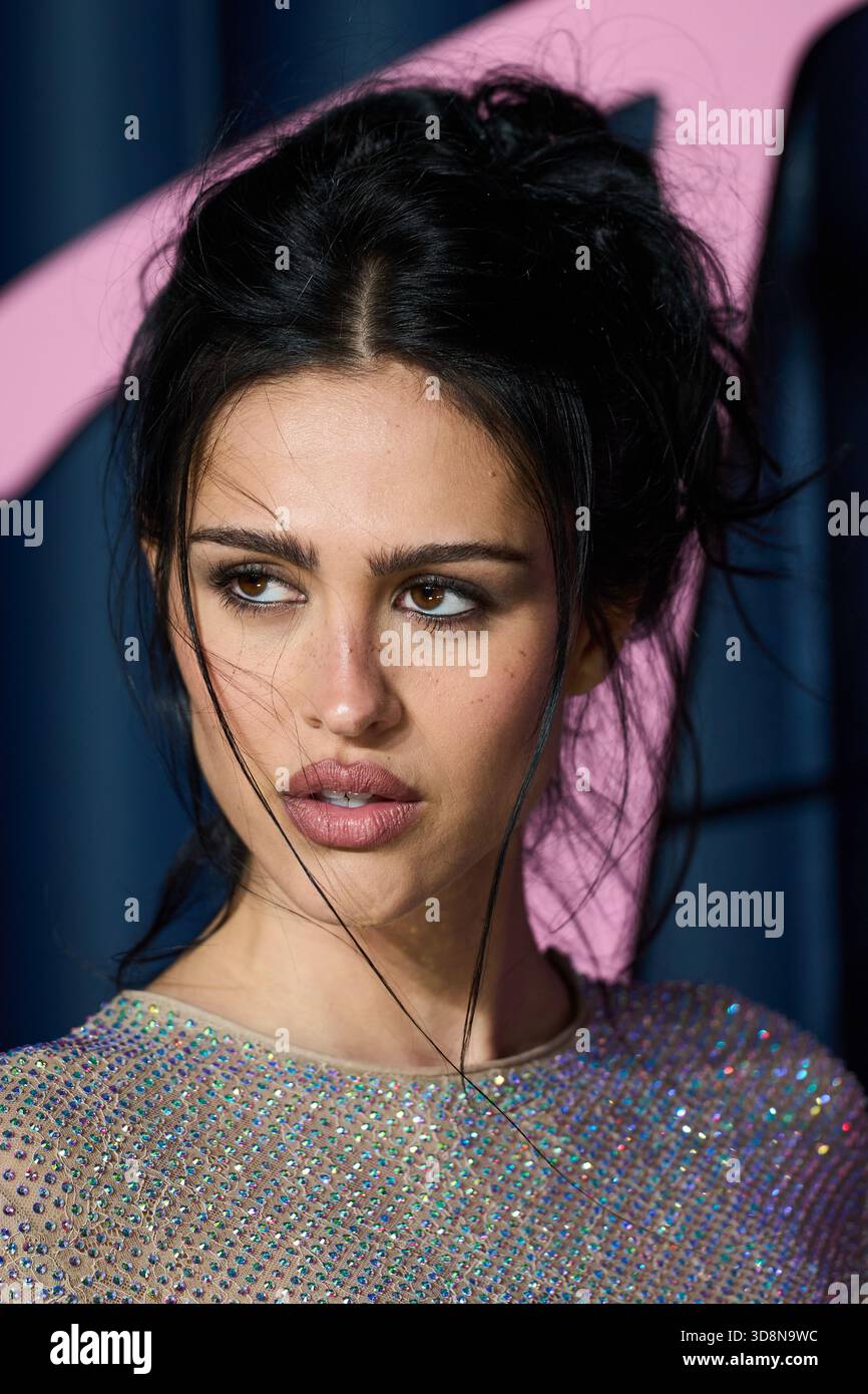 Amelia Gray Hamlin Poses For Photographers Upon Arrival At The Fashion