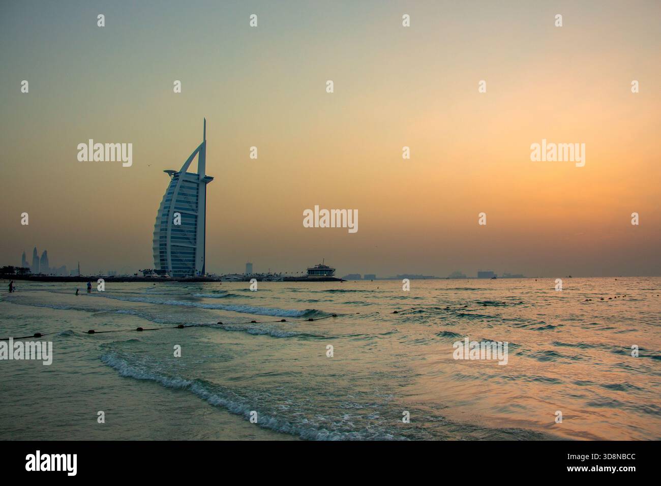 View of the iconic Burj Al Arab rising majestically from the tranquil ...