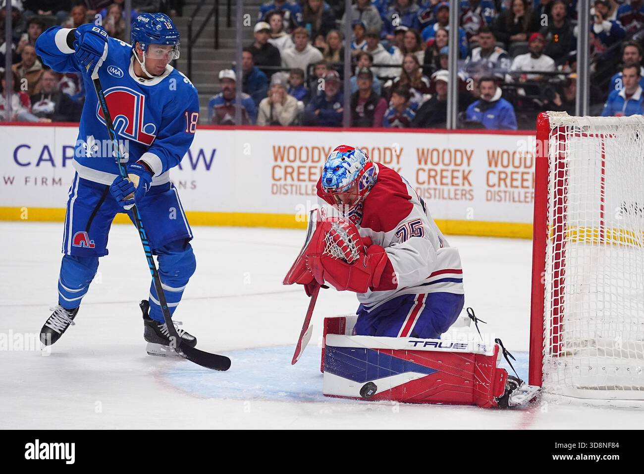 Montreal Canadiens goaltender Jakub Dobes (75) stops a shot off the ...
