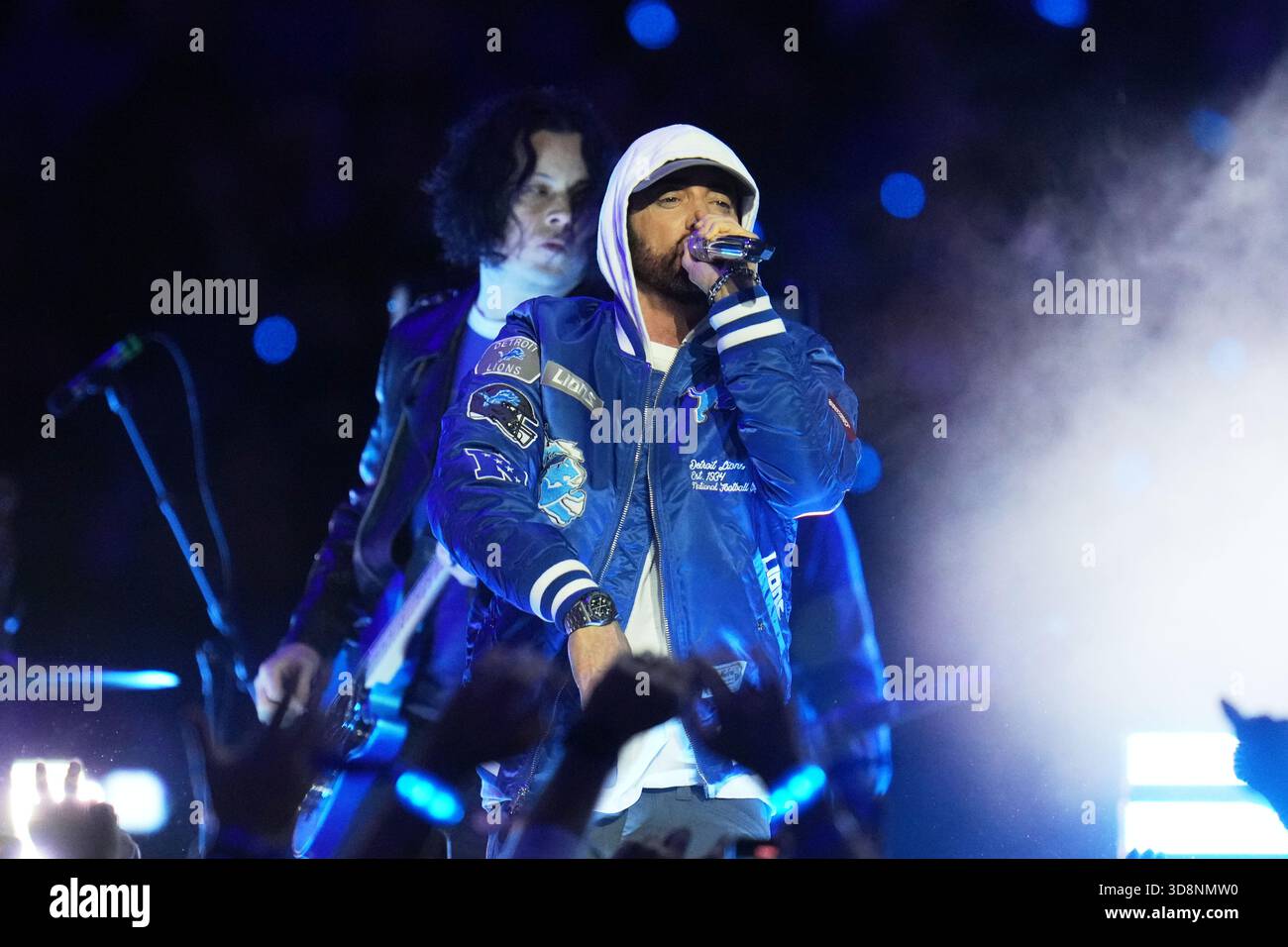 Eminem performs with Jack White during an NFL football game between the ...