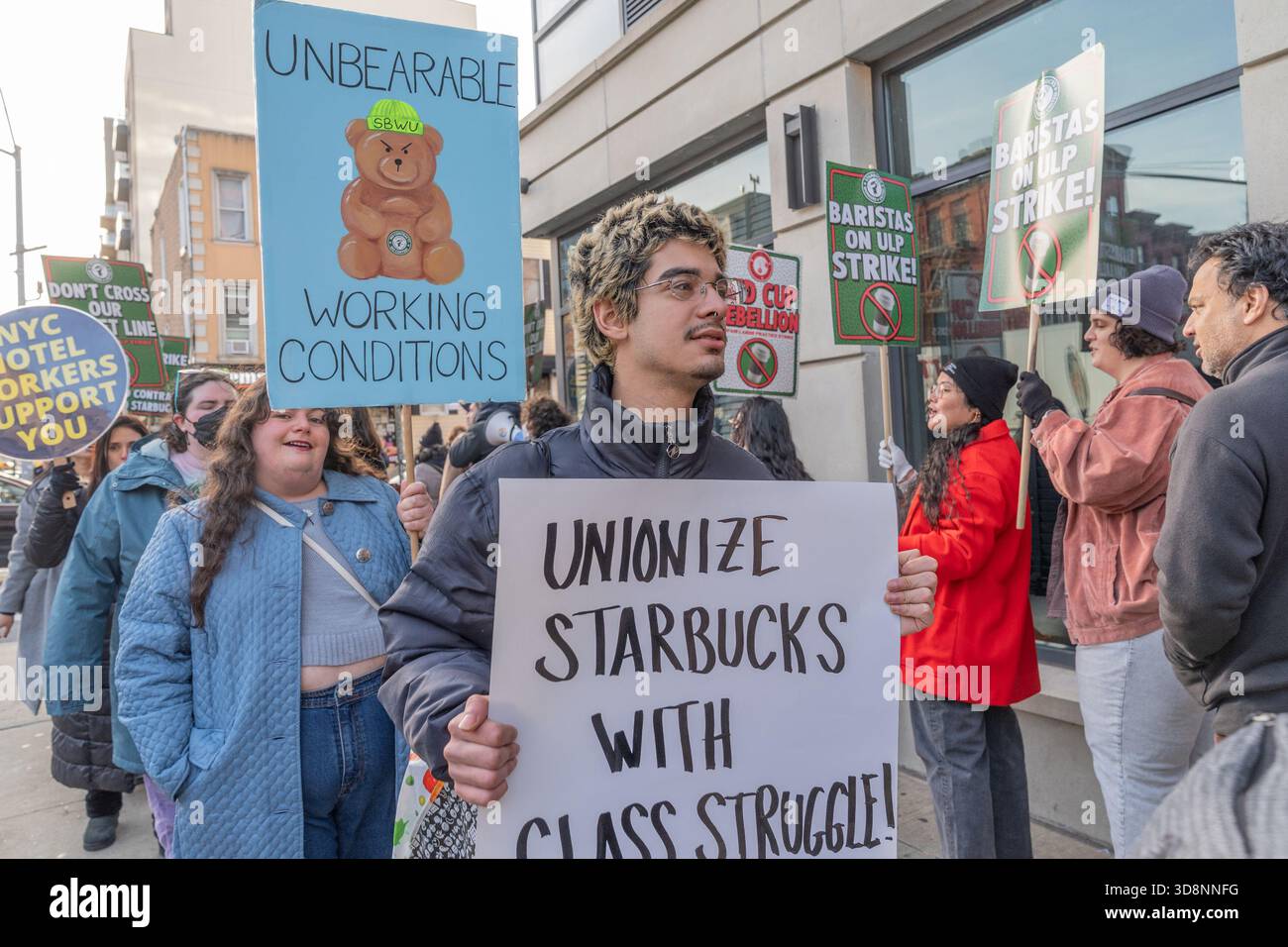 Picket line of striking Starbucks workers in front of Starbucks on 4th ...