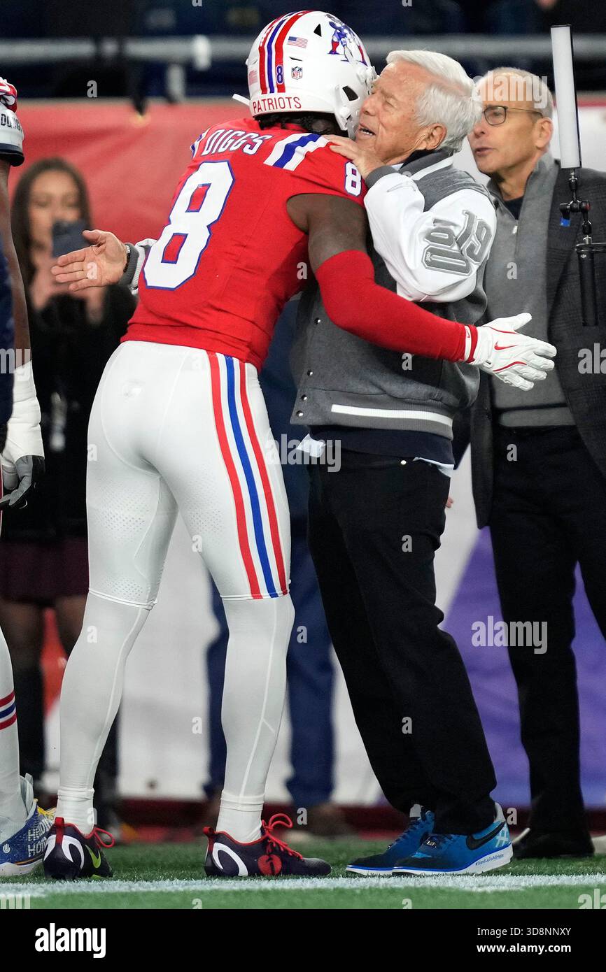 New England Patriots wide receiver Stefon Diggs (8) hugs owner Robert ...