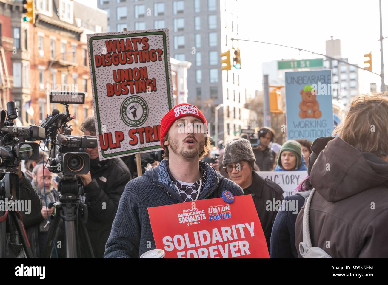 Picket line of striking Starbucks workers in front of Starbucks on 4th ...